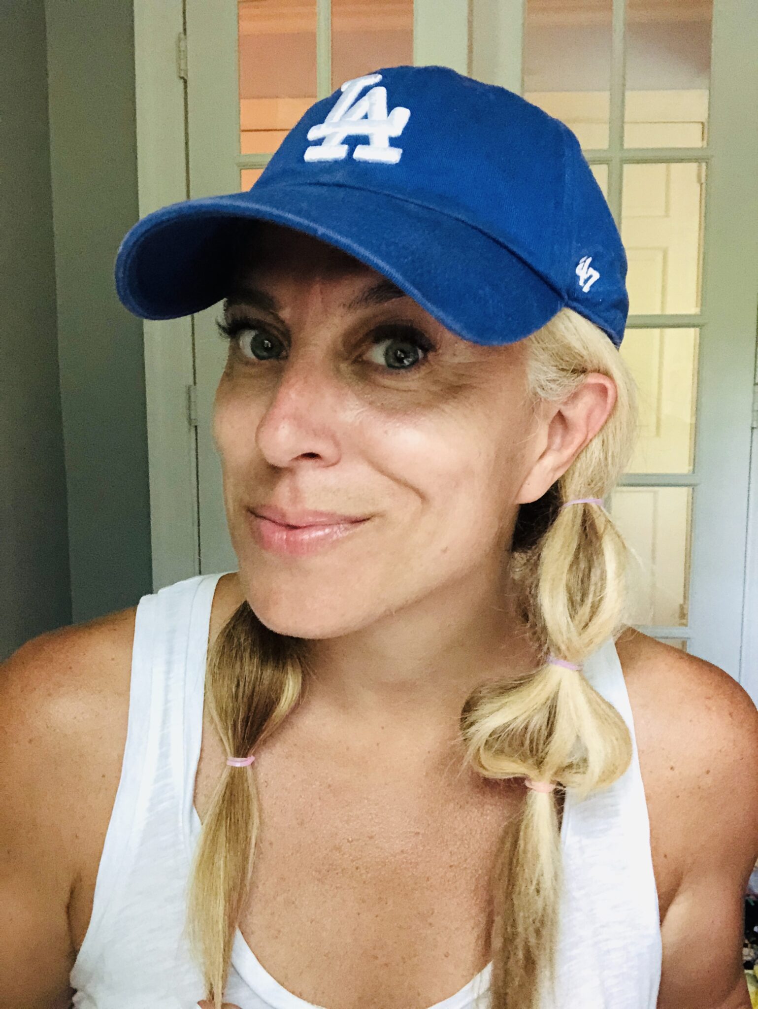 How To Wear A Baseball Hat With Long Hair Stylish Life For Moms