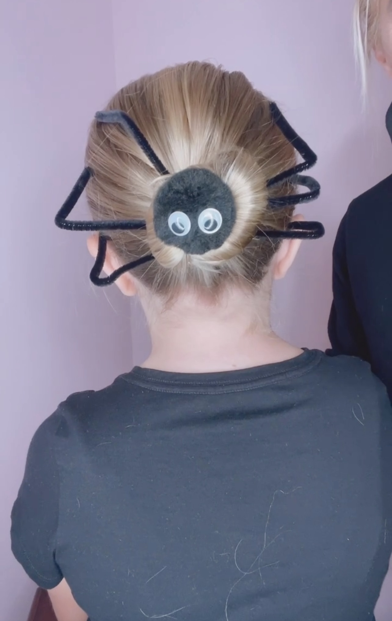 Cute Spider Bun Hair Tutorial for Halloween - Stylish Life for Moms